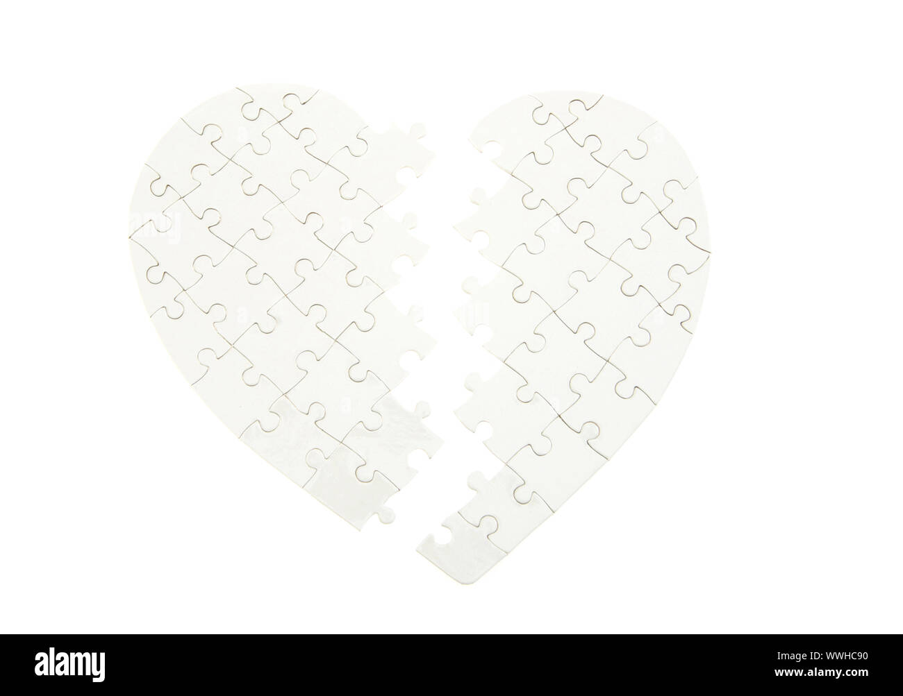 heart made from the puzzle on white Stock Photo - Alamy