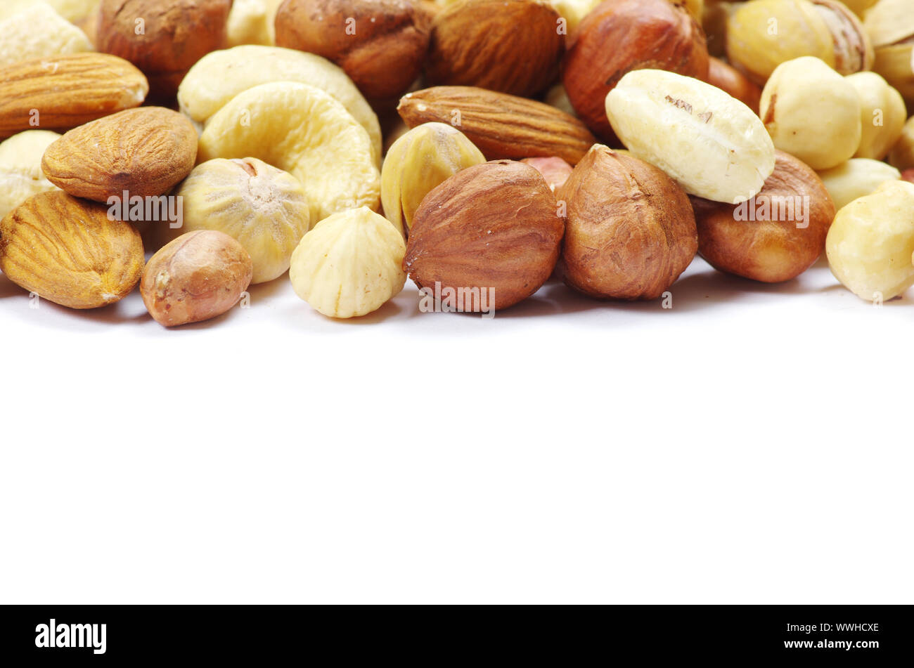 mixed nuts on white background Stock Photo - Alamy