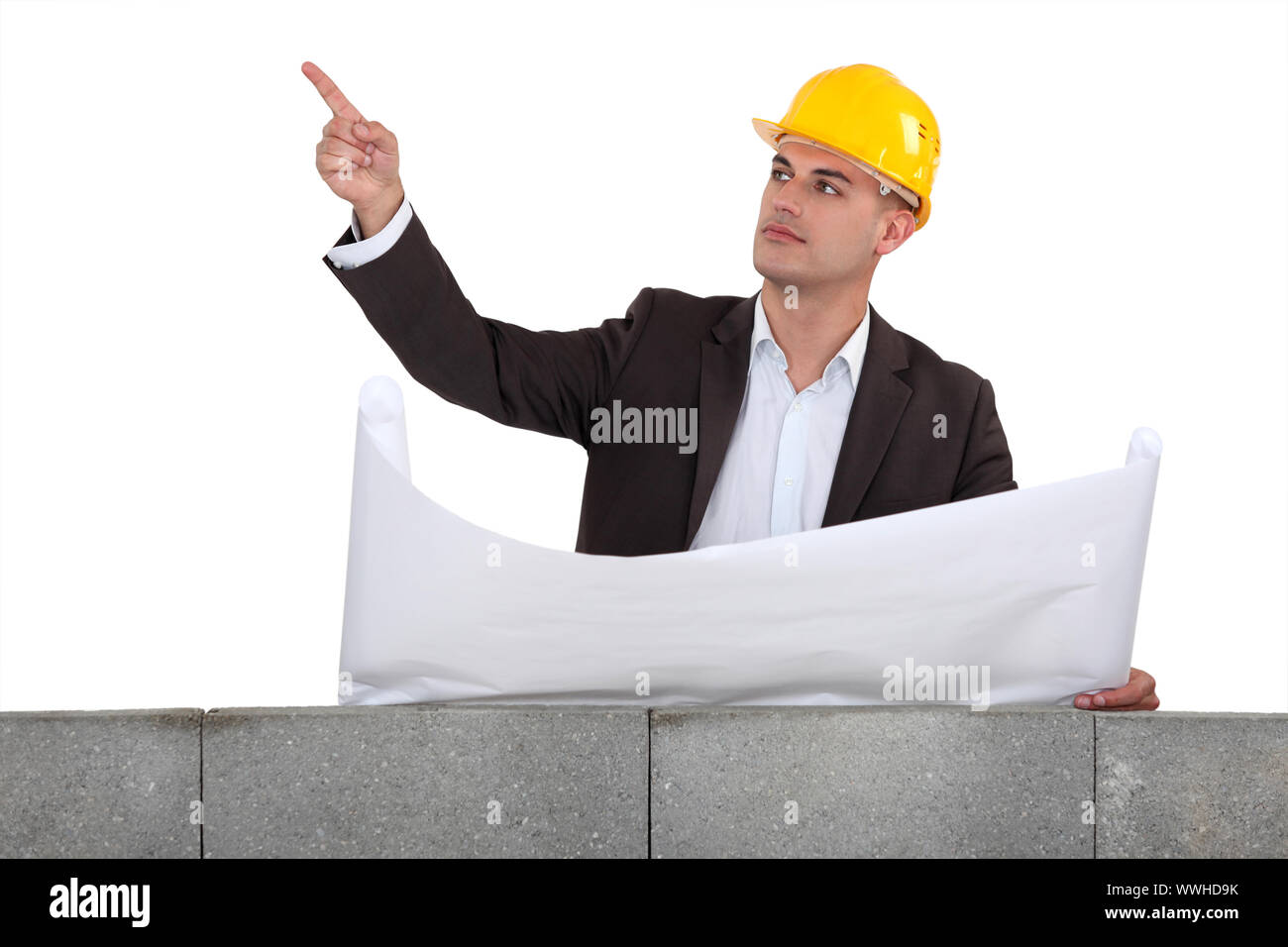 Engineer pointing to an area Stock Photo - Alamy