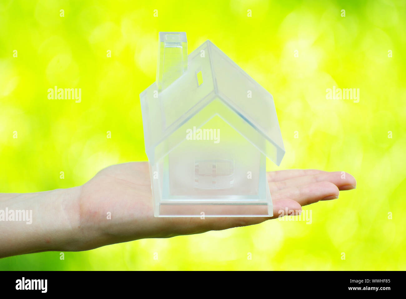 The house in human hand Stock Photo - Alamy