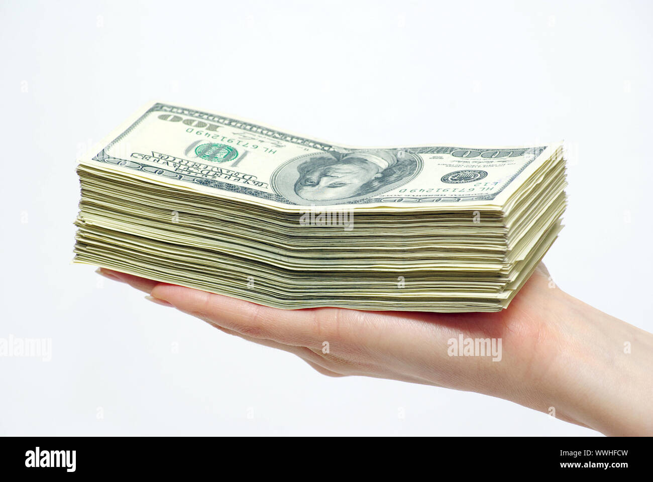 Hand with money isolated on white background Stock Photo - Alamy