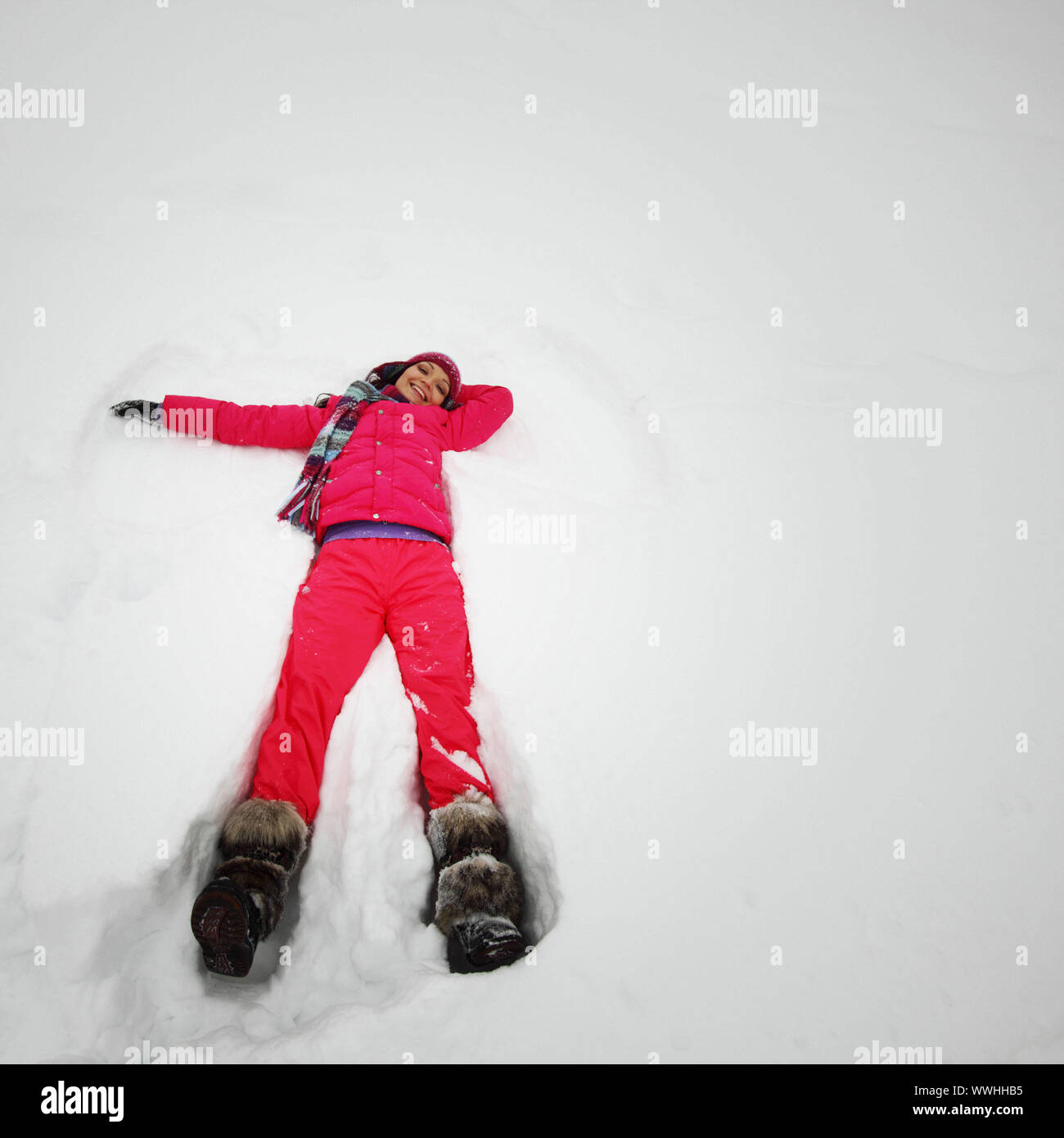 winter woman lay on snow Stock Photo - Alamy