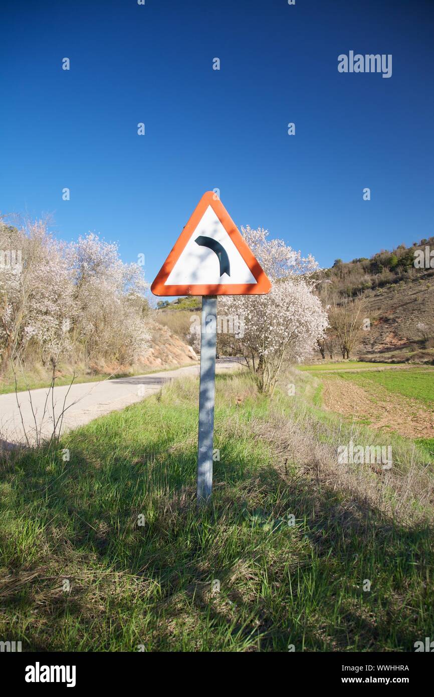 danger curve at a rural road in Spain Stock Photo - Alamy