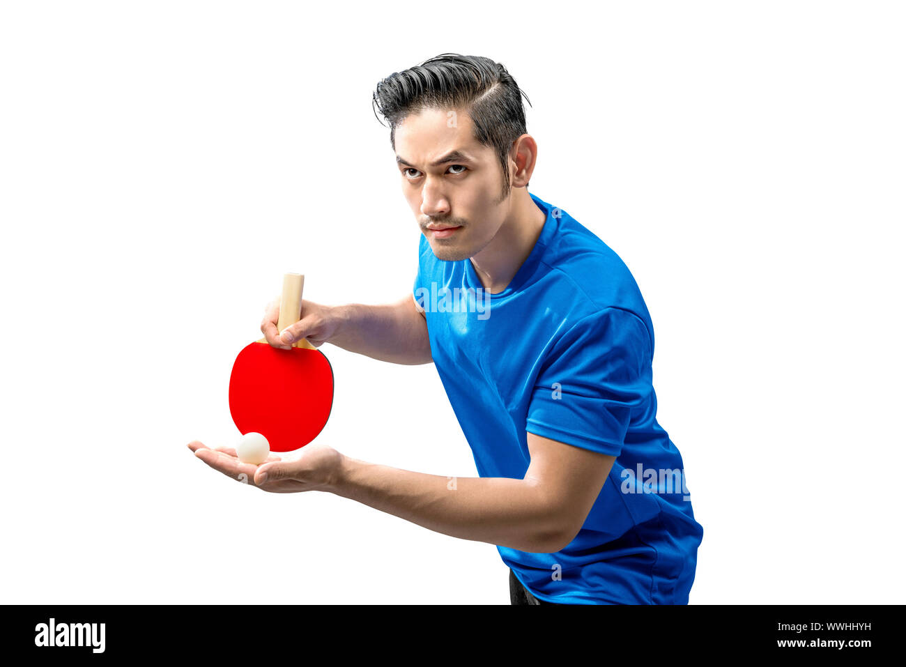 Asian table tennis player man in serving position isolated over white ...