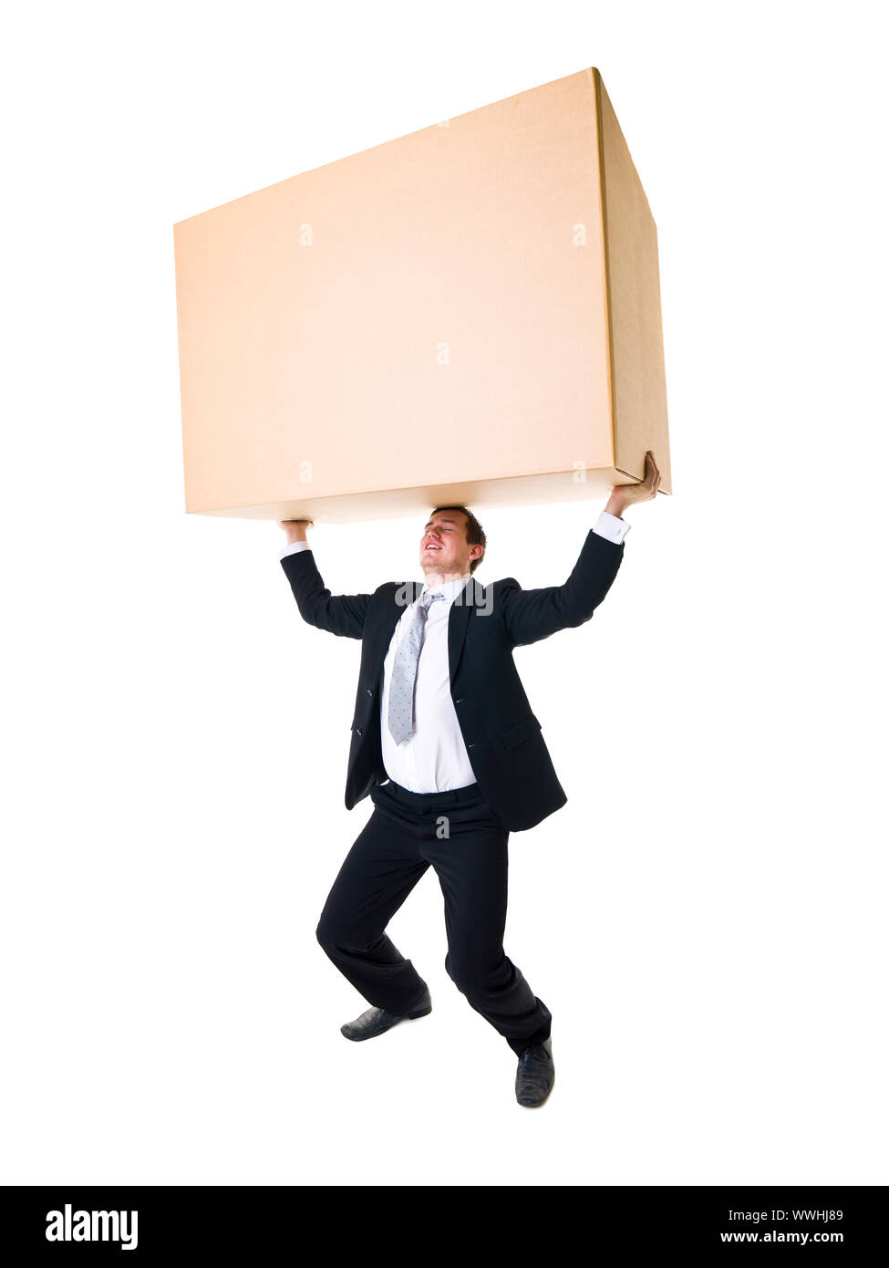 Well dressed man carrying a heavy cardboard Box isolated on white ...