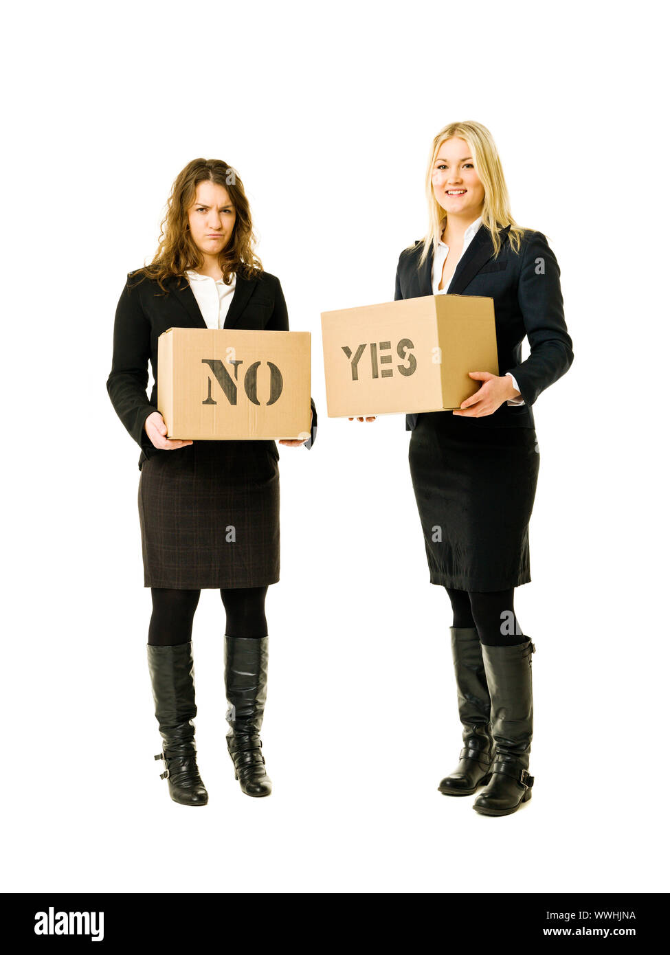 Businesswomen with yes- and no cardboard boxes isolated on white ...