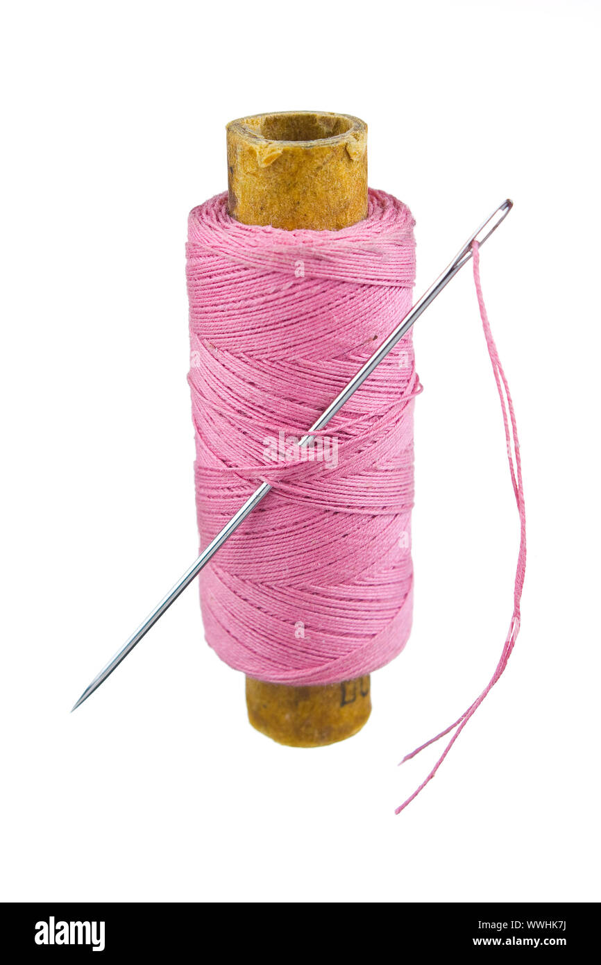 Sewing thread isolated on white background Stock Photo - Alamy
