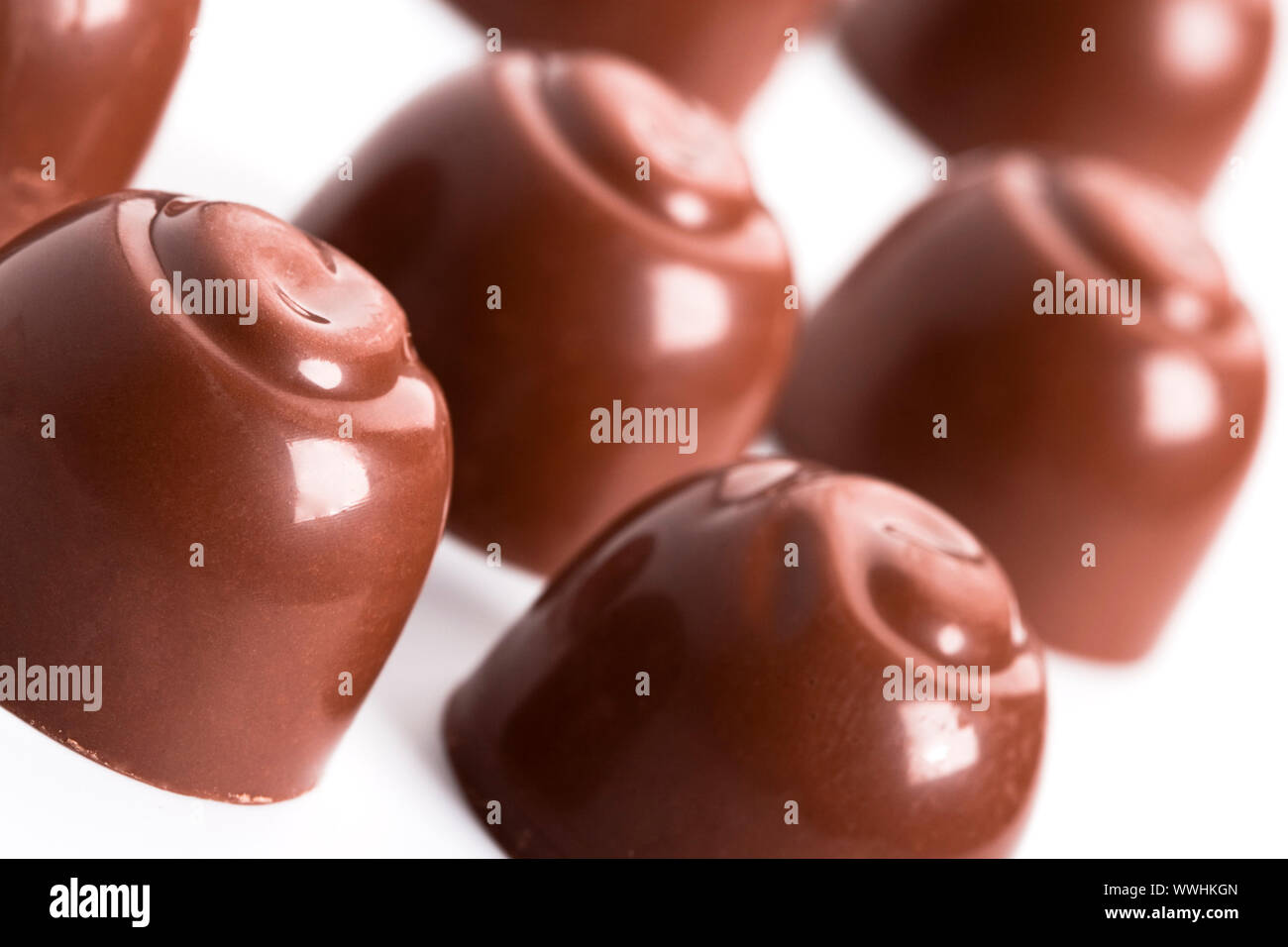 chocolate sweets closeup on a white background Stock Photo - Alamy