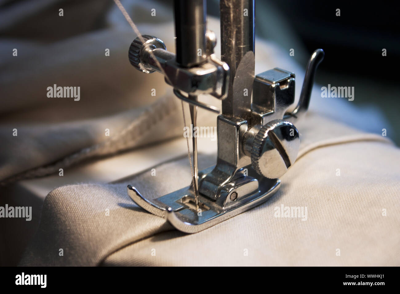 sewing machine and item of clothing Stock Photo - Alamy