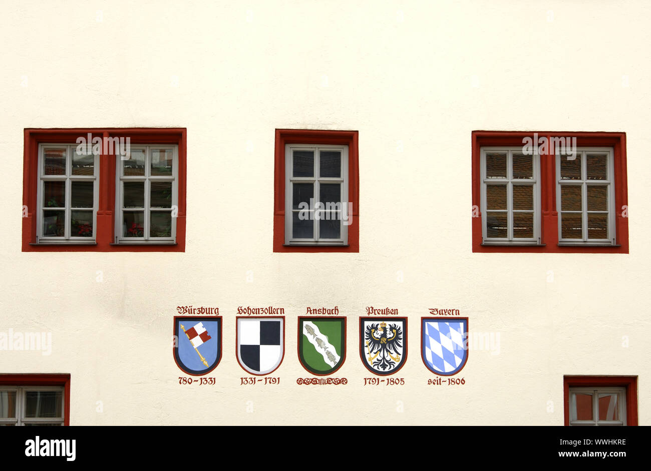 coat of arms above the archway, town hall Ansbach Stock Photo - Alamy
