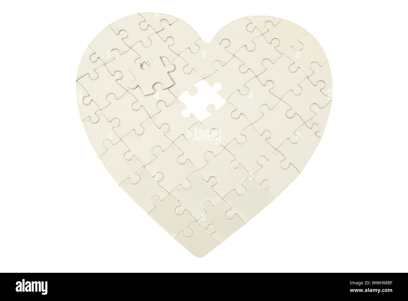 heart made from the puzzle on white Stock Photo - Alamy