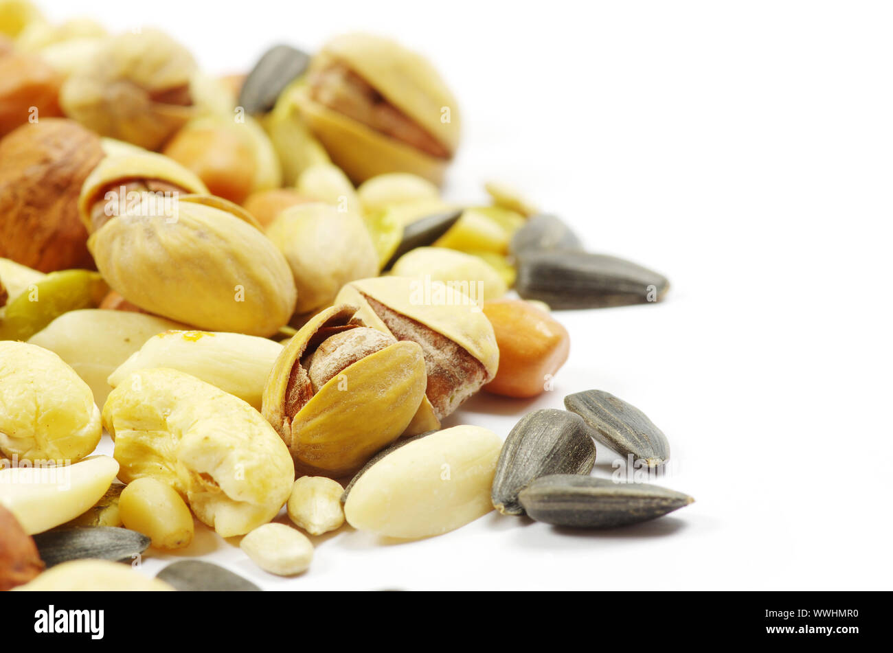 nuts and seeds isolated on white background Stock Photo - Alamy