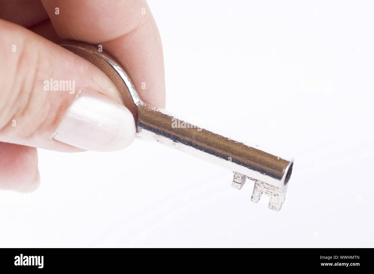 Hand with key Stock Photo - Alamy