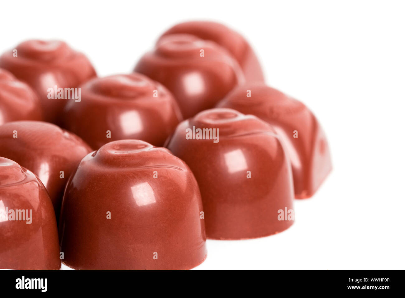 chocolate sweets closeup on a white background Stock Photo - Alamy