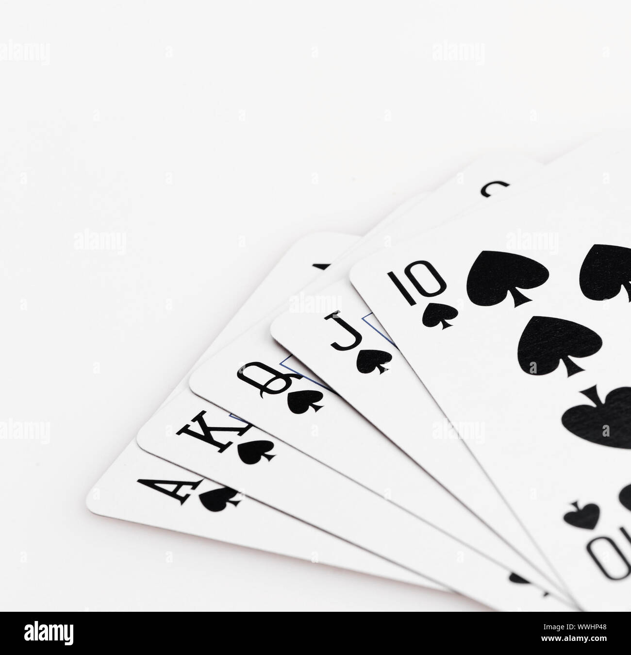Royal flush of spade on white background Stock Photo - Alamy