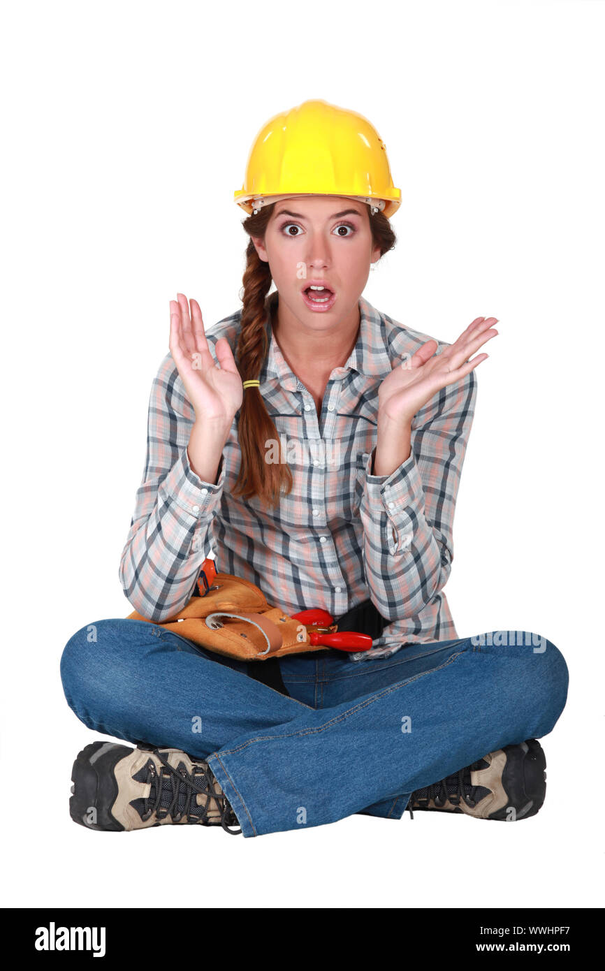 A clueless female construction worker Stock Photo - Alamy