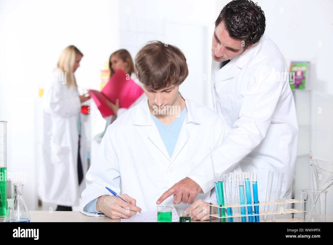 Teacher explaining science experiment hi-res stock photography and ...