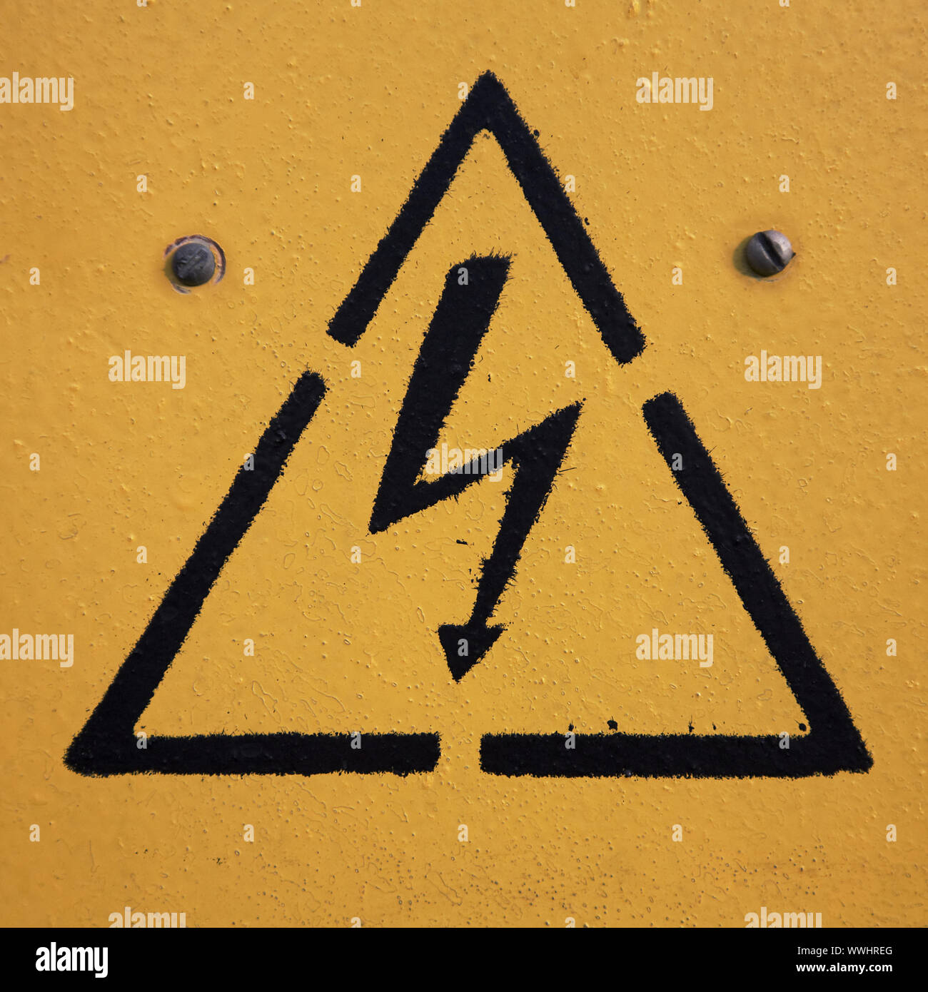 The orange warning metal tablet Stock Photo - Alamy
