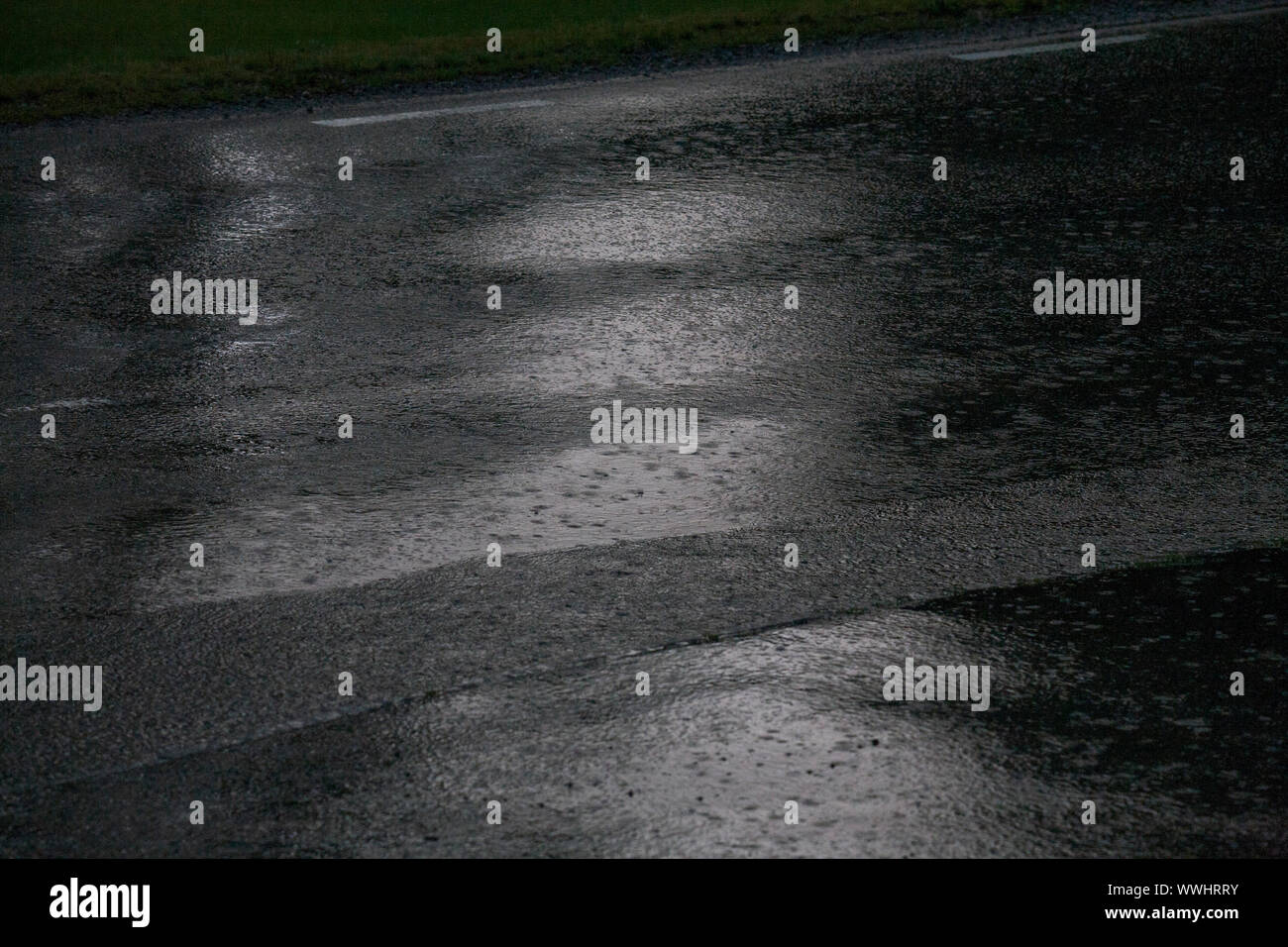 Rain on the road hi-res stock photography and images - Alamy