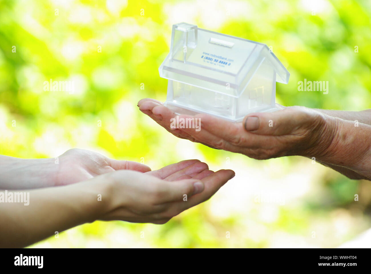 The house in human hand Stock Photo - Alamy