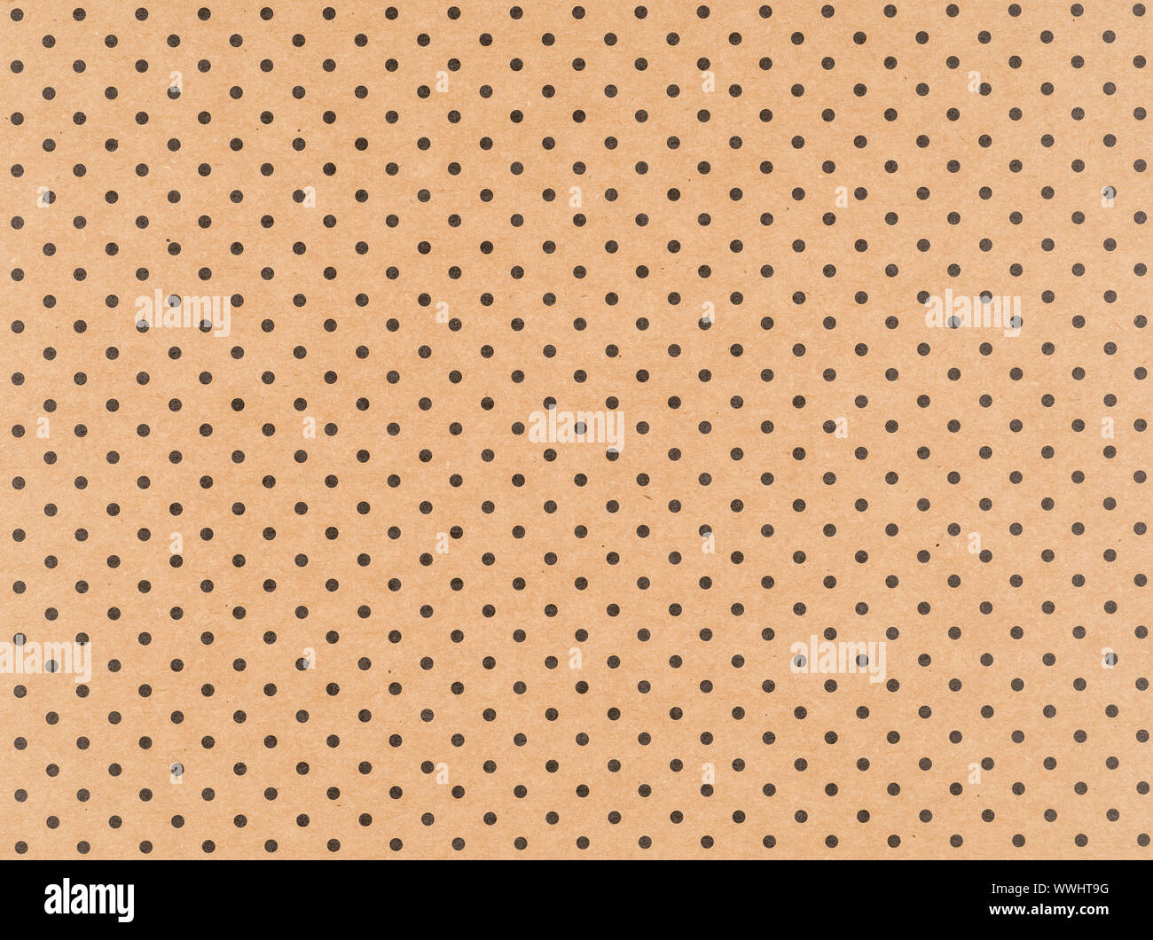 Brown craft paper with small black dots Stock Photo - Alamy