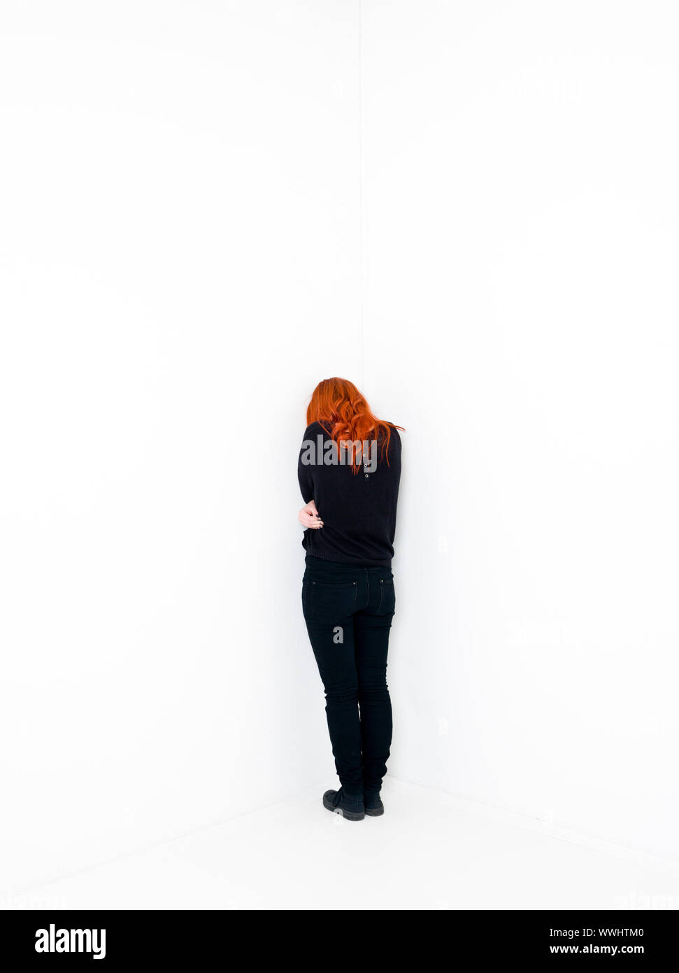 Young woman sitting in back Cut Out Stock Images & Pictures - Alamy