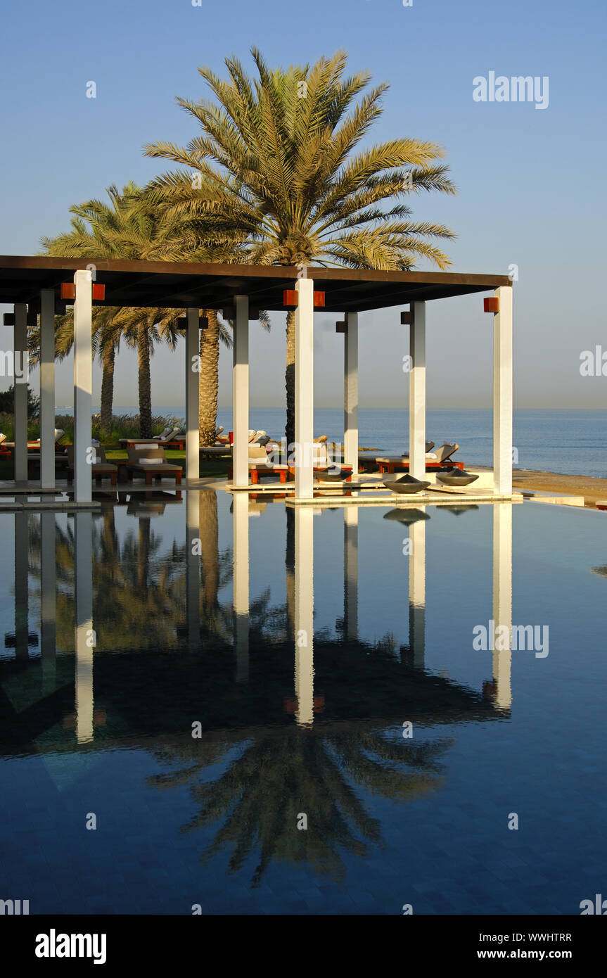 Morning rest at the swimming pool Stock Photo - Alamy