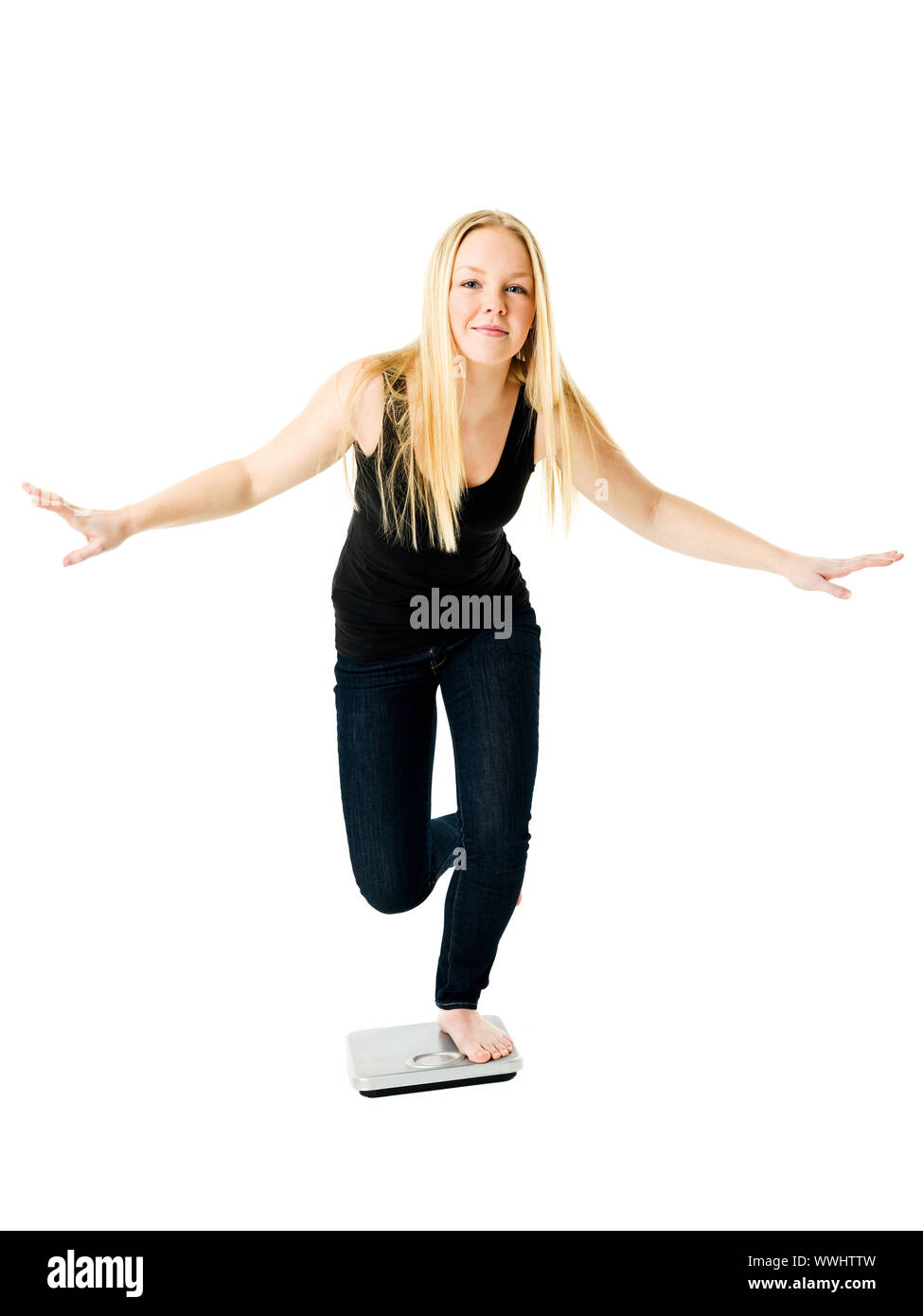 Young Girl on weight scale isolated on white background Stock Photo - Alamy