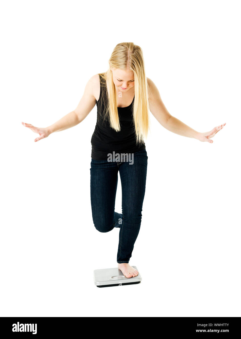 Young Girl on weight scale isolated on white background Stock Photo - Alamy