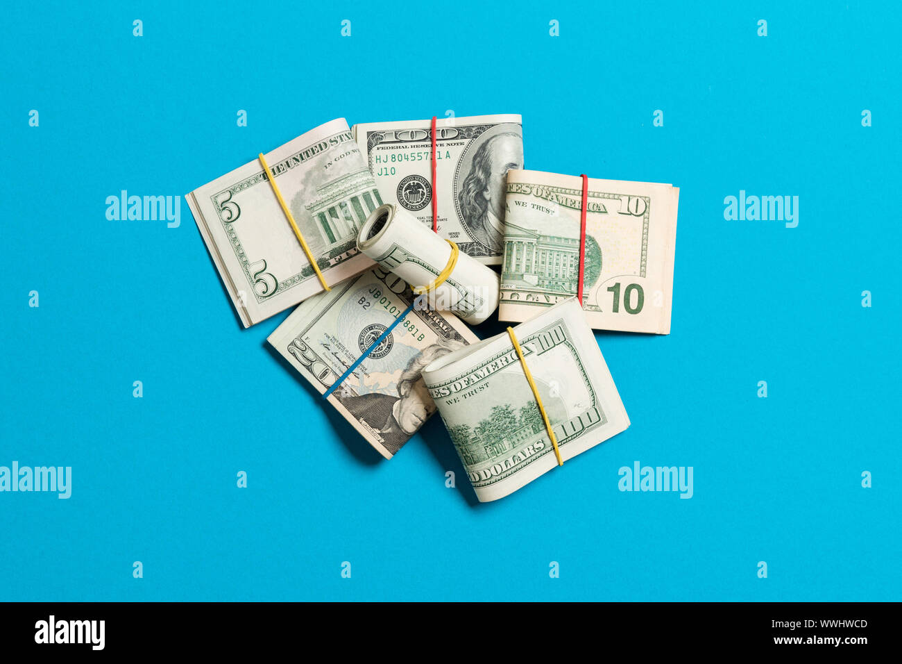 US Dollar bills bundles stack. one hundred dollar bills with stack of ...