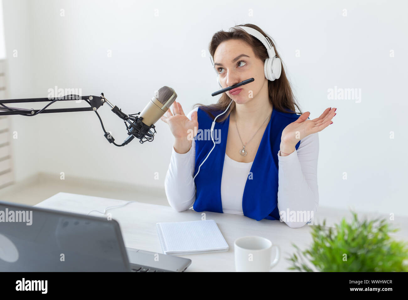 Radio host concept - Portrait of funny woman radio presenter with ...