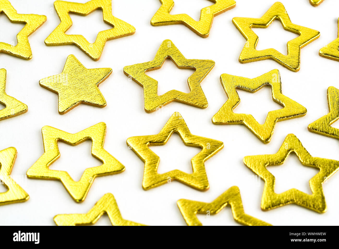 Gold stars on white Stock Photo - Alamy