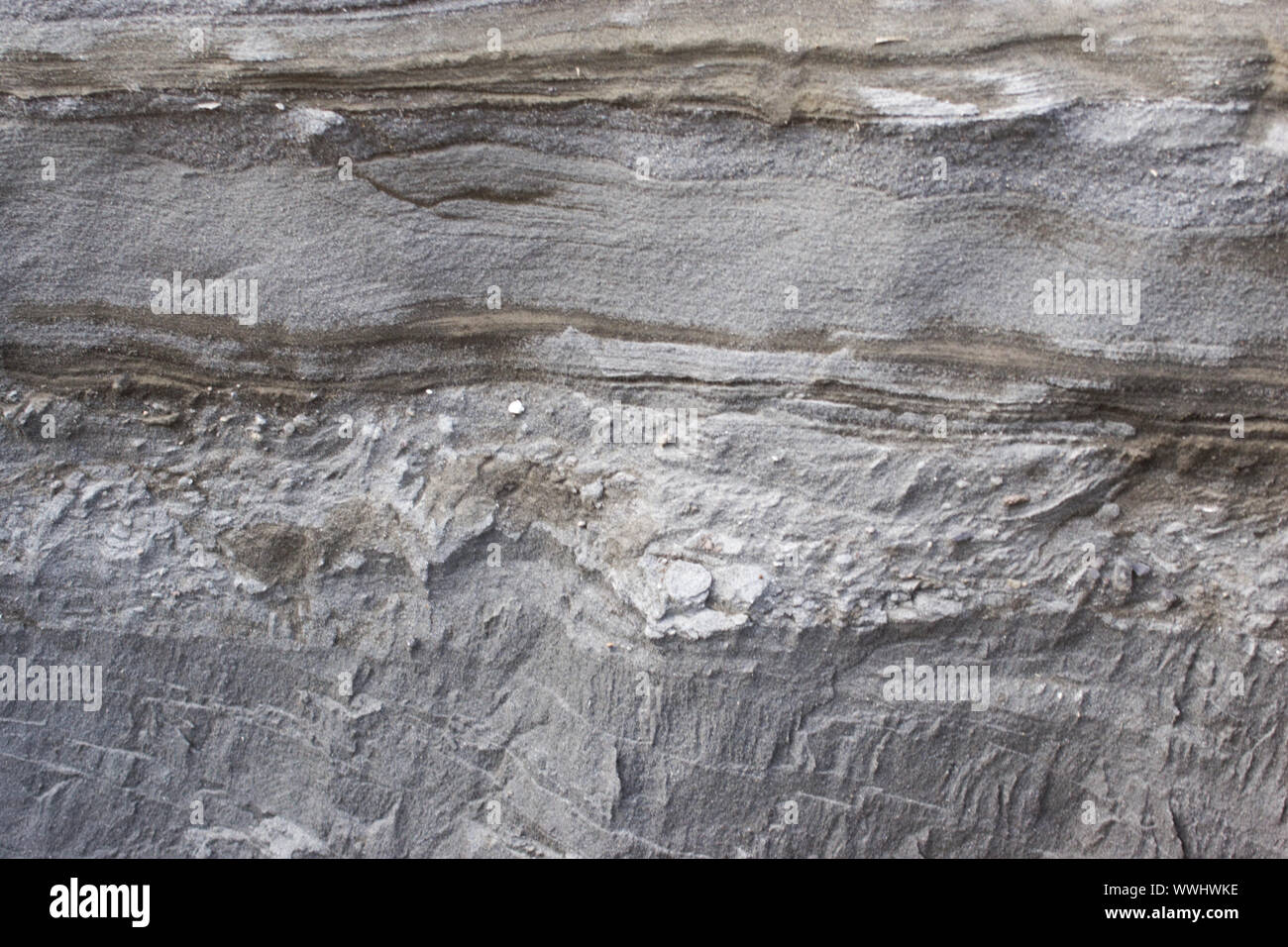 Cut of ground with visible layers Stock Photo - Alamy