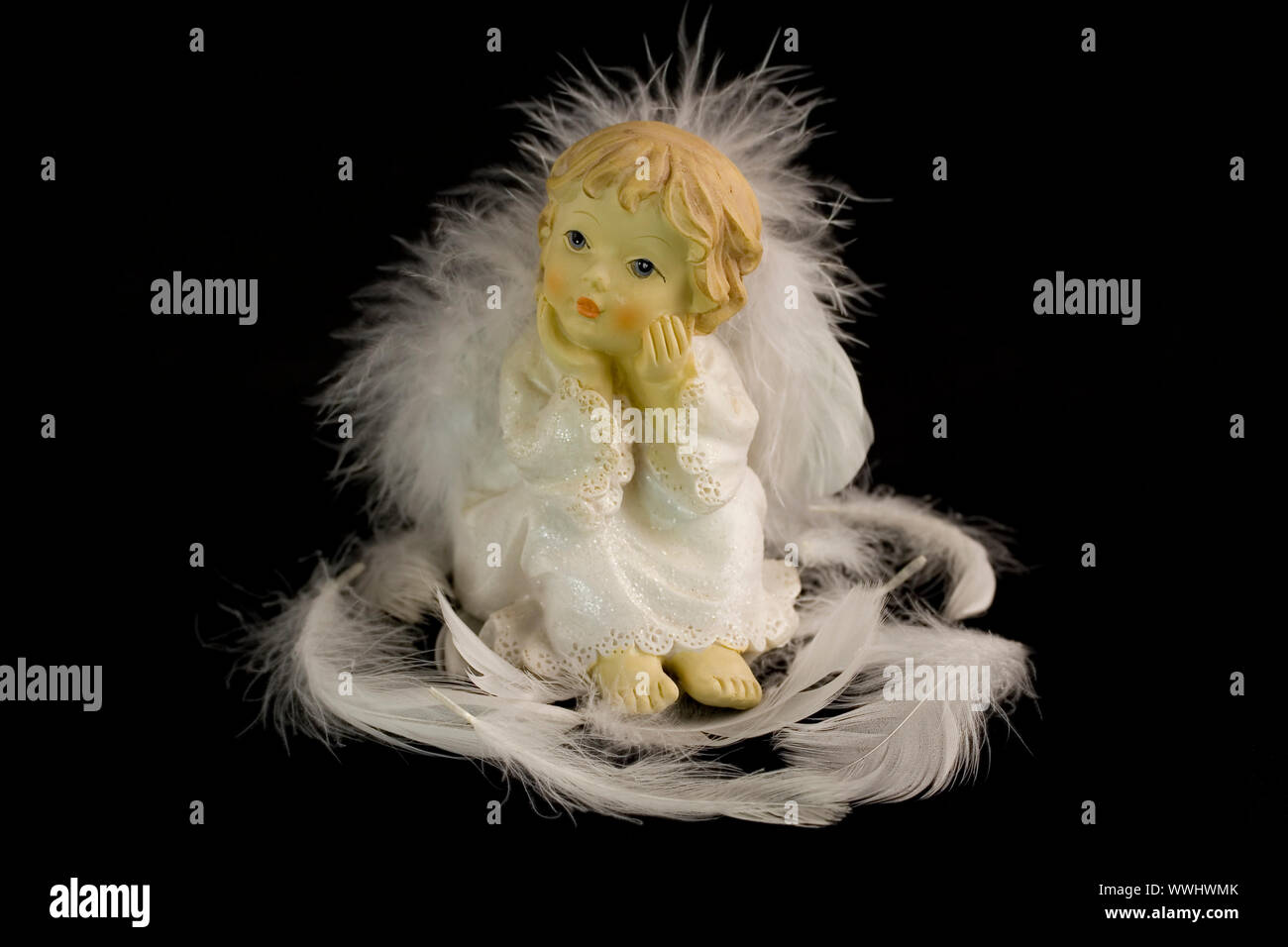 Little angel. Black background Stock Photo - Alamy