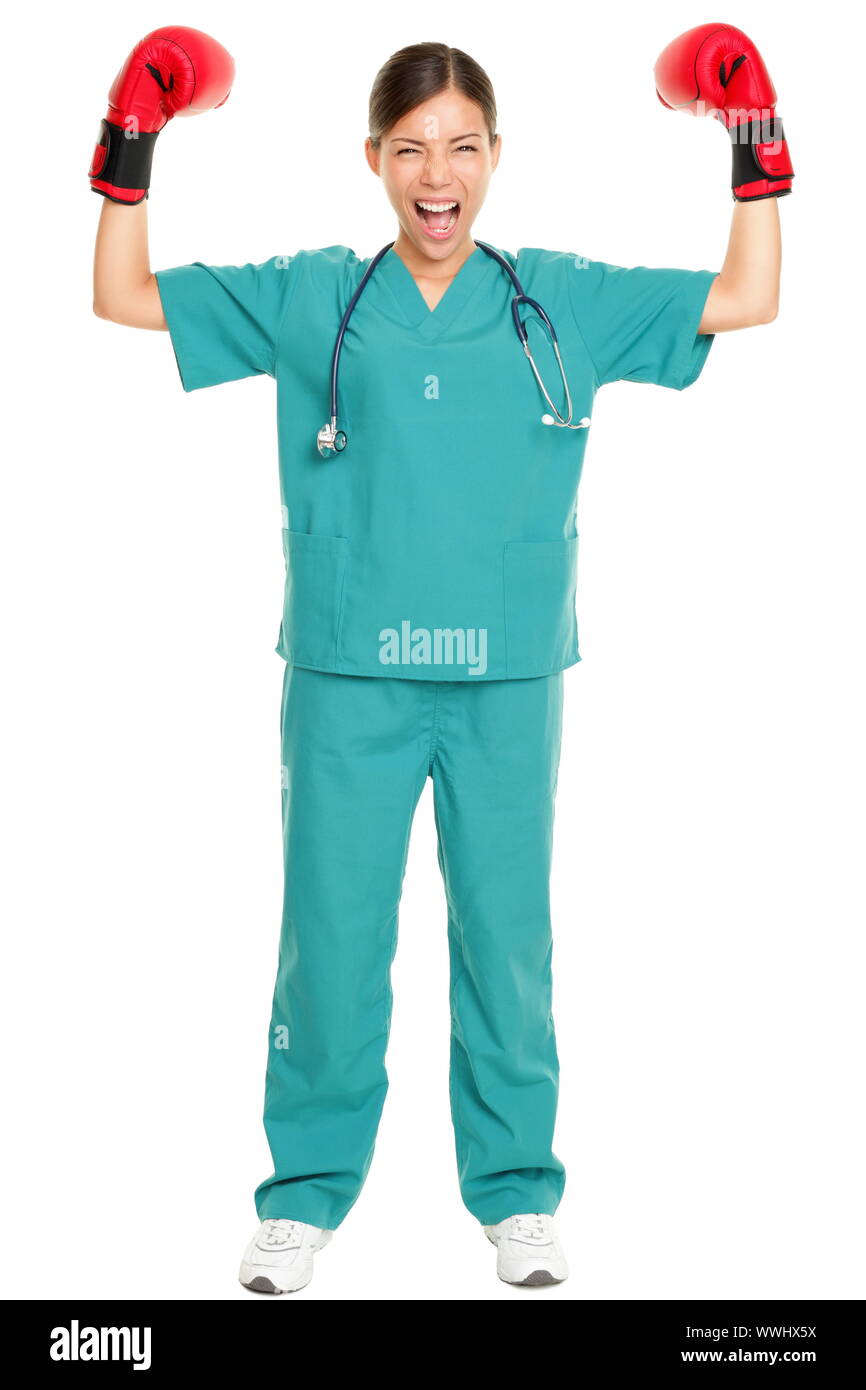 Medical nurse / doctor boxing challenge concept image. Young nurse in ...