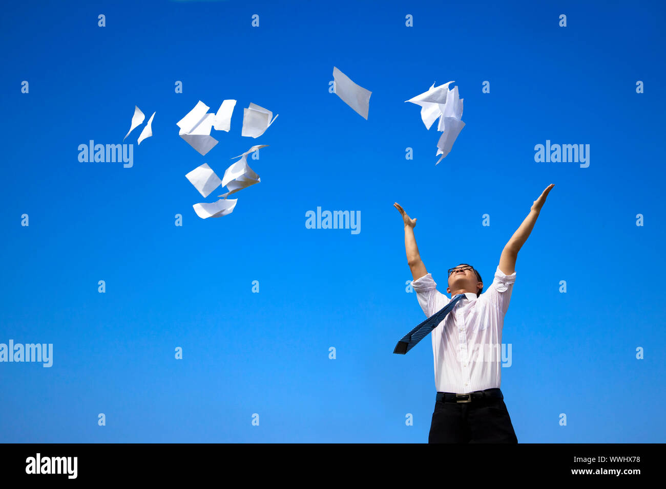 Throwing papers sky man hi-res stock photography and images - Alamy