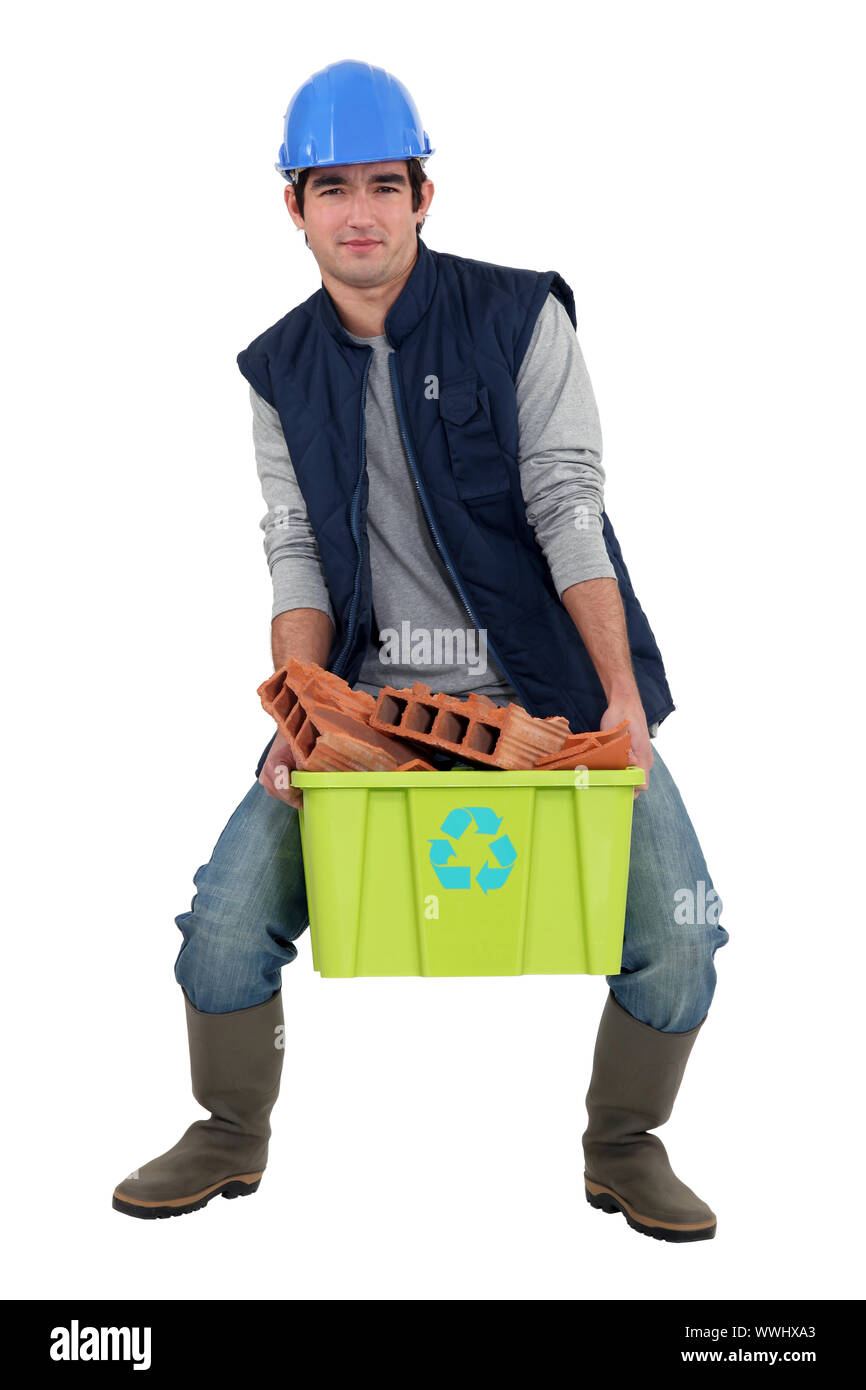 Man recycling bricks Stock Photo - Alamy