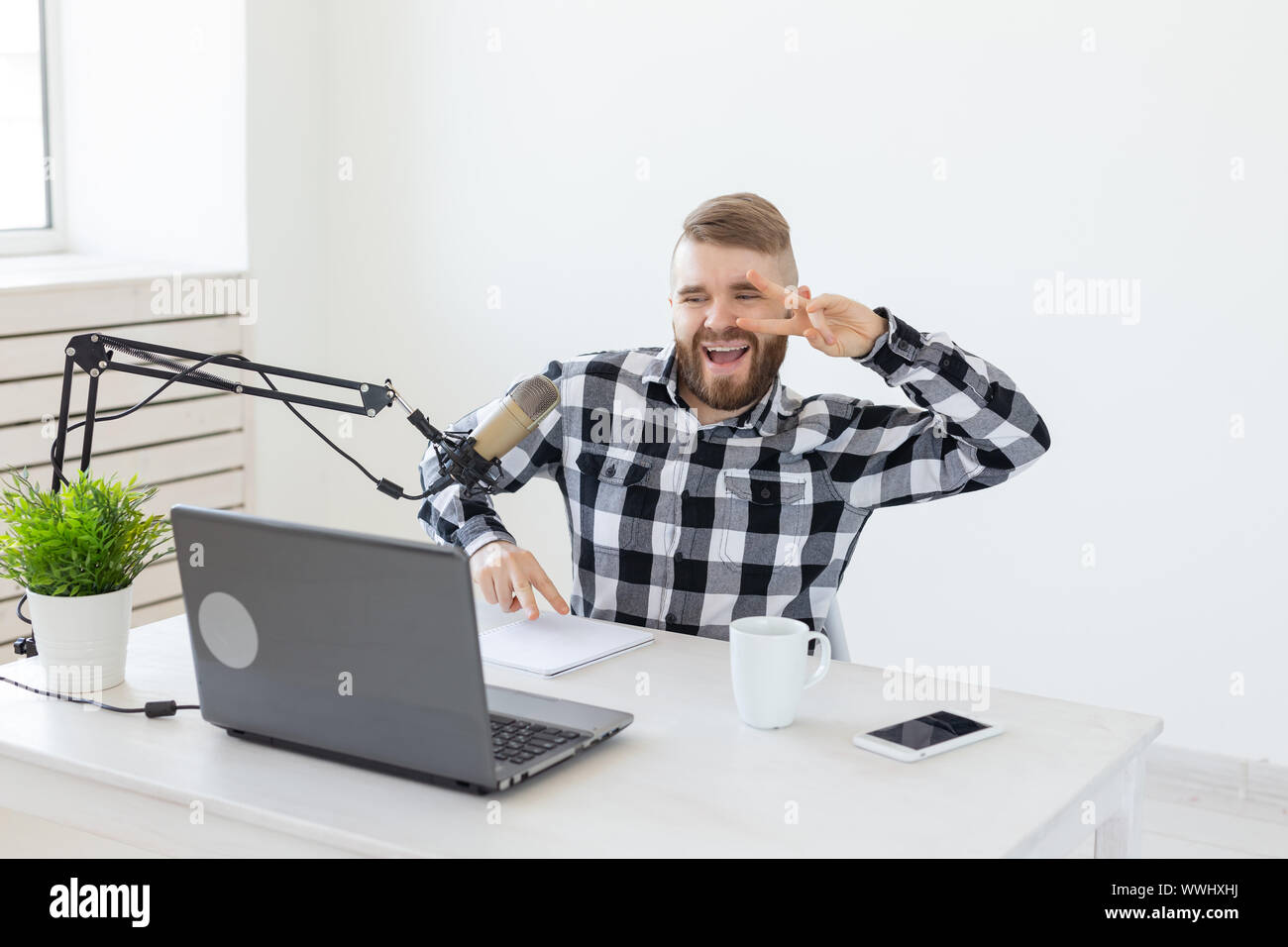Radio host, streamer and blogger concept - Handsome man working as ...