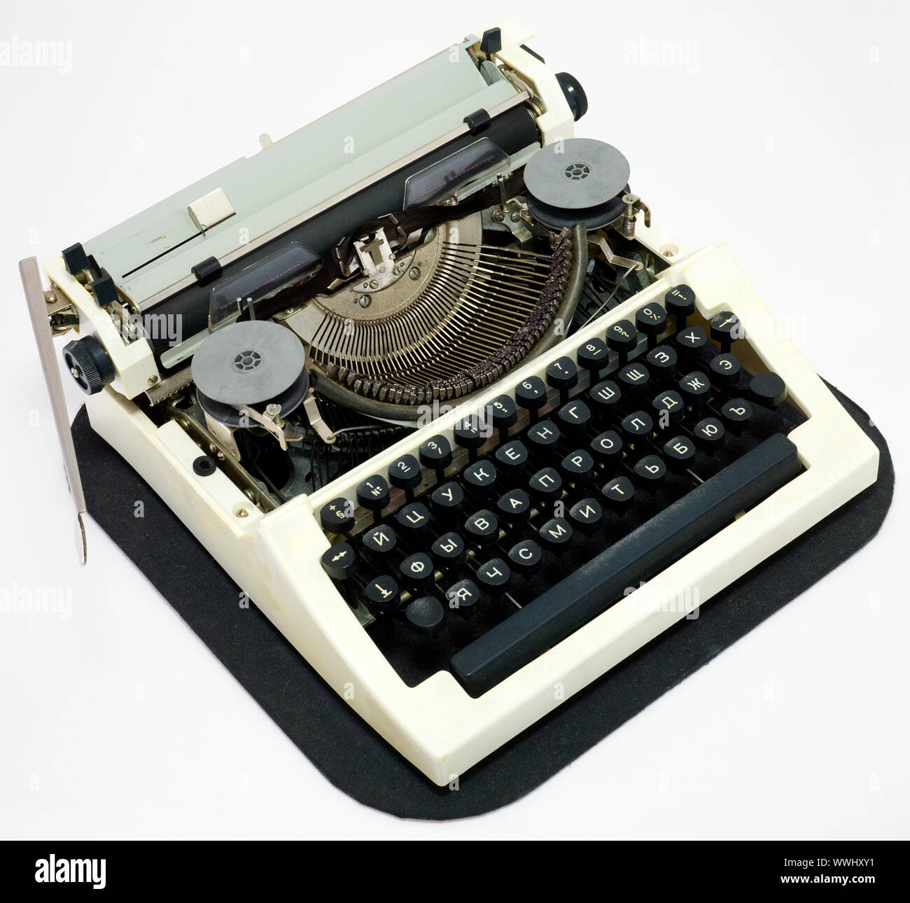 Old ancient typewriter on a white background Stock Photo - Alamy