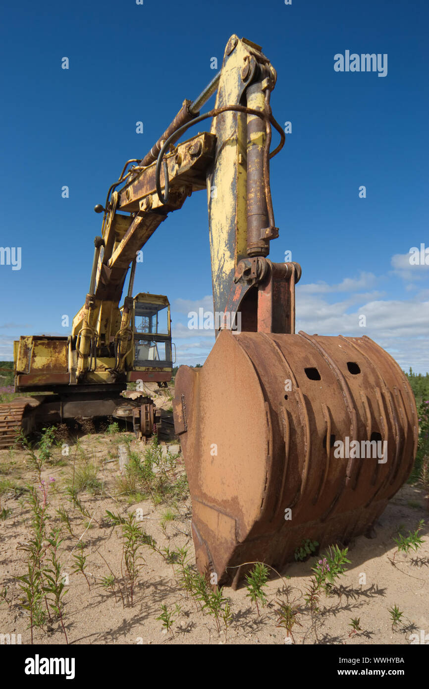 Old destruction rusty excavator Stock Photo - Alamy