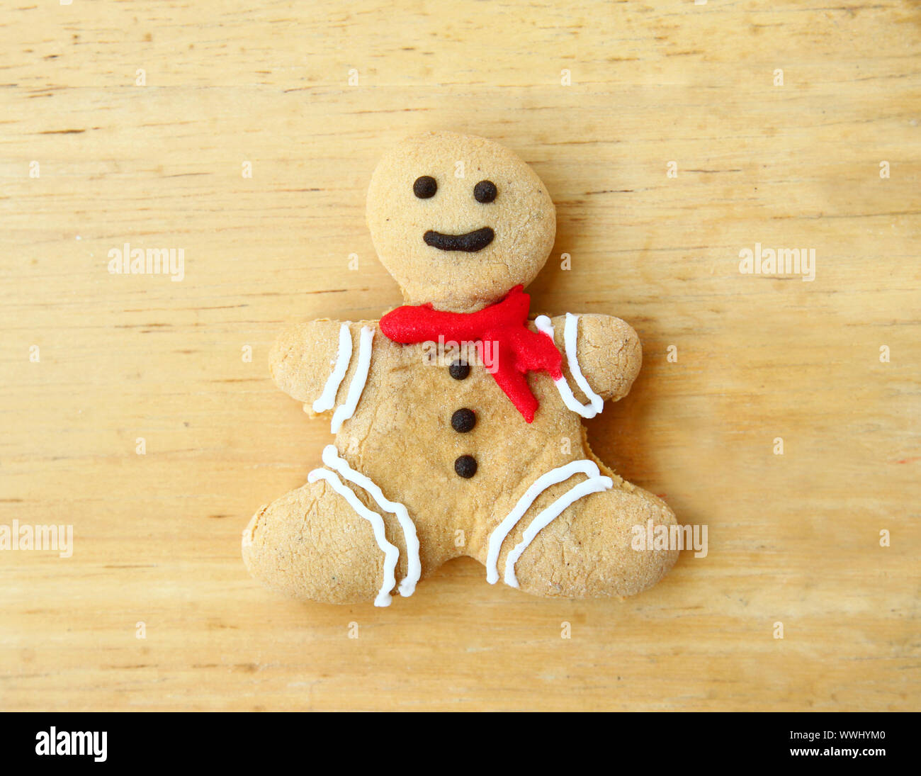 Gingerbread man on wooden background Stock Photo - Alamy