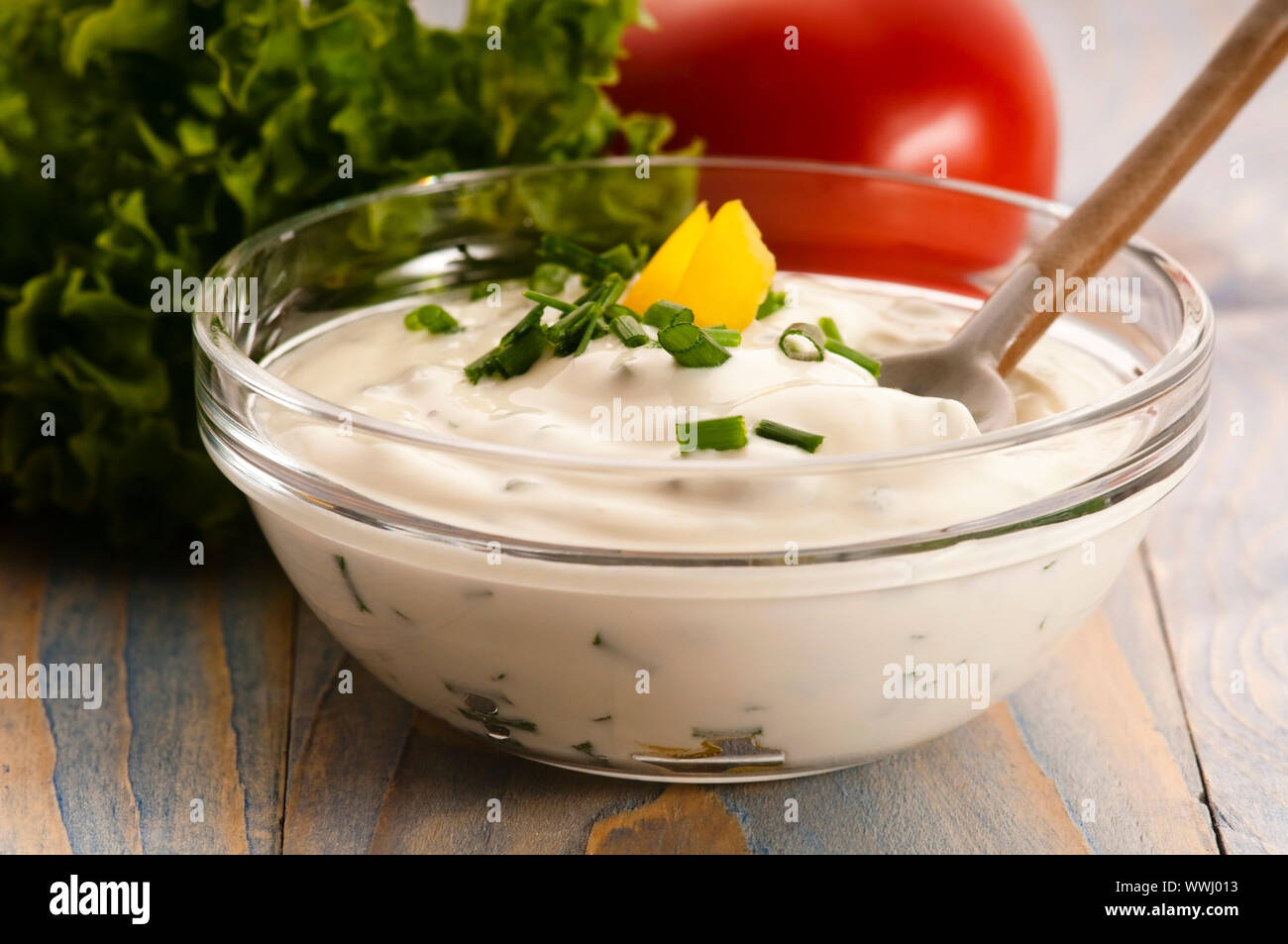 Delicious cream cheese with chives and vegetables Stock Photo - Alamy
