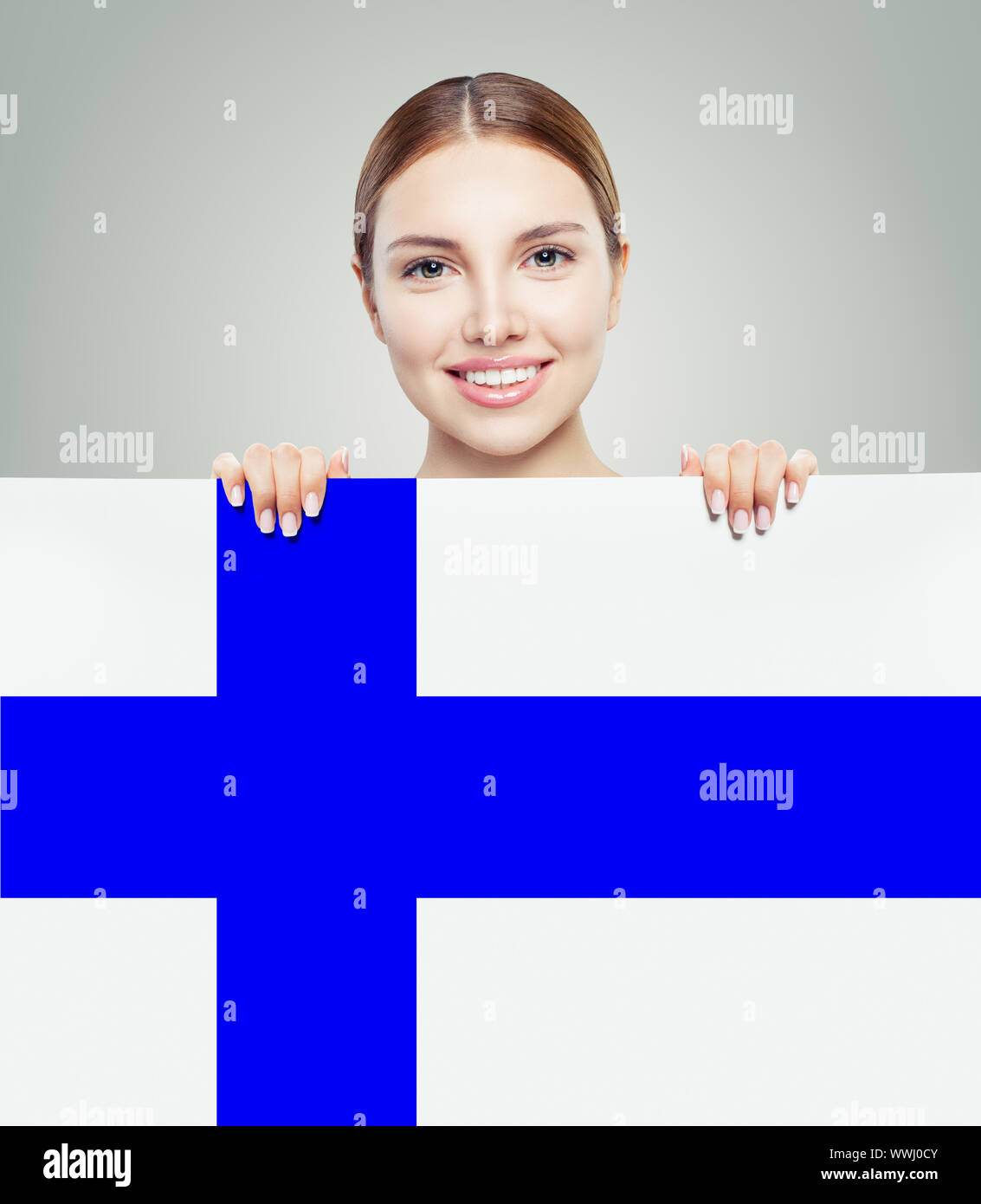 Finland. Young cute happy woman with Finnish flag background Stock ...