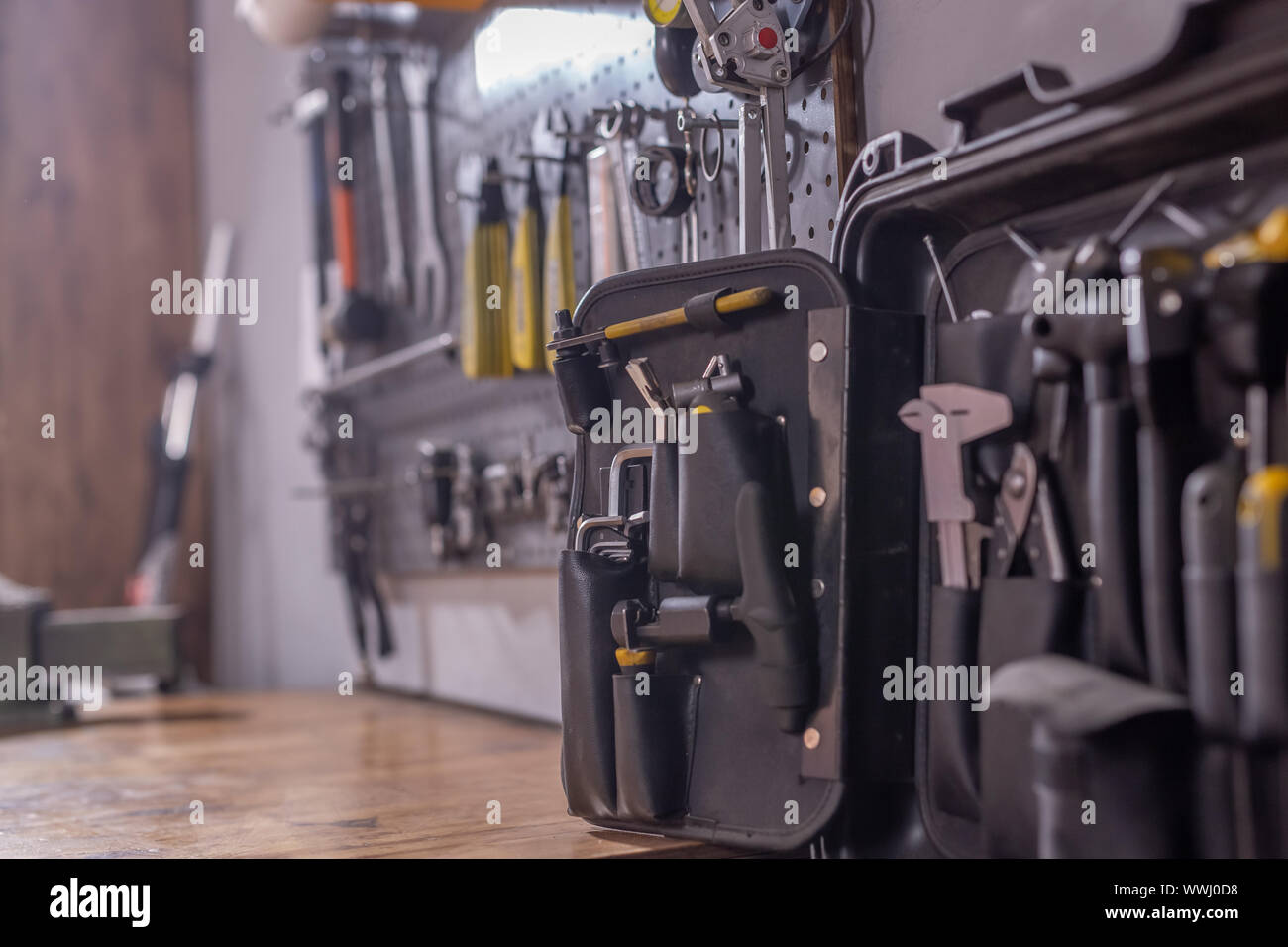 Set of tools, screws, pliers and nuts on a workshop background Stock ...