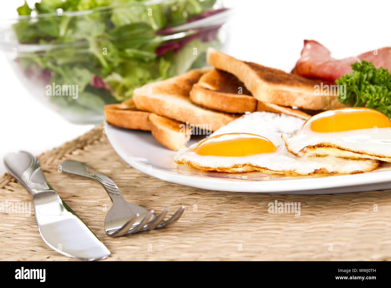 Breakfast with eggs bacon beans and toasts Stock Photo - Alamy