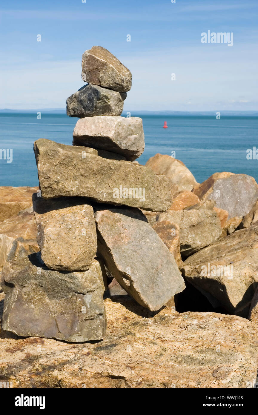 a rock statue built near the ocean Stock Photo - Alamy