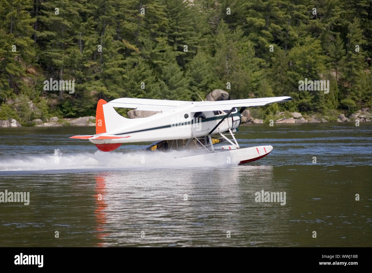 White water plane landing on a river Stock Photo - Alamy