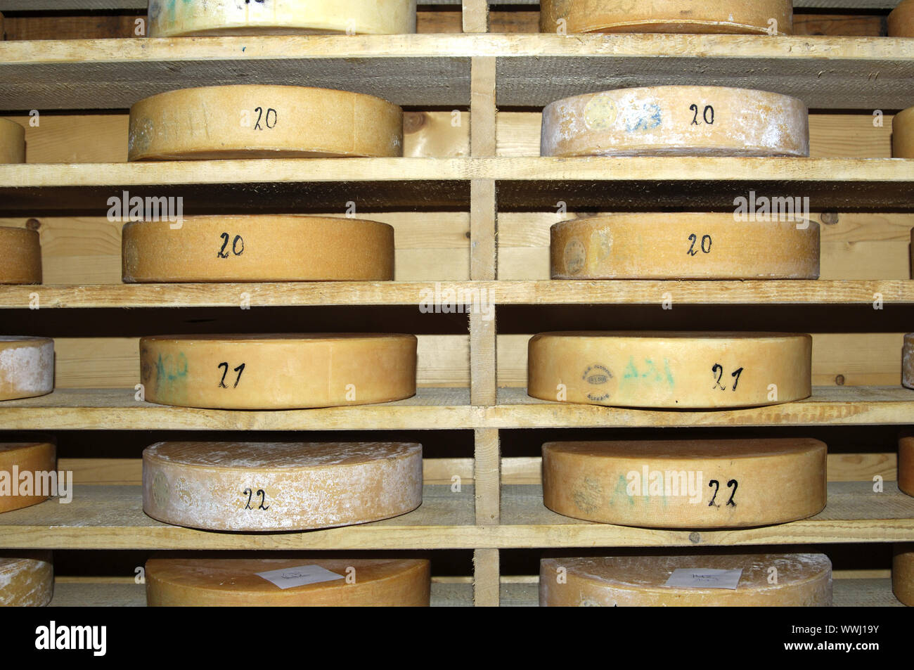 Swiss alp cheese in the attic Stock Photo - Alamy