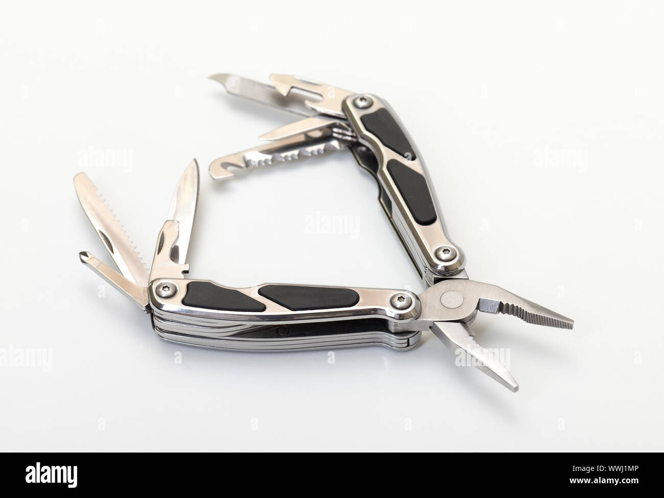 Steel pliers folding multi tool opened on white background Stock Photo ...
