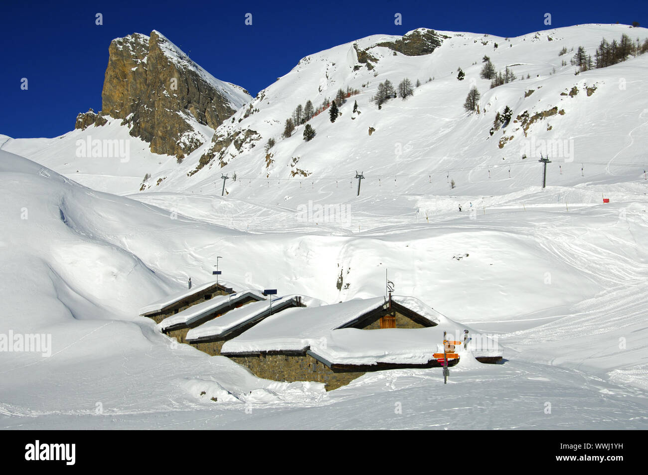 Snow-covered alpine huts, Valais Stock Photo - Alamy